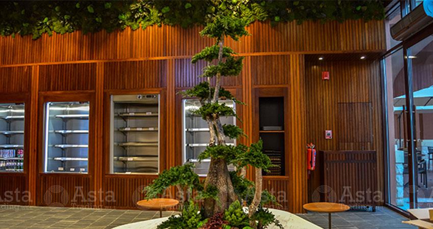 Indoor Lanscape with Preserved TreesGraze Café | Asta Trading W.L.L.